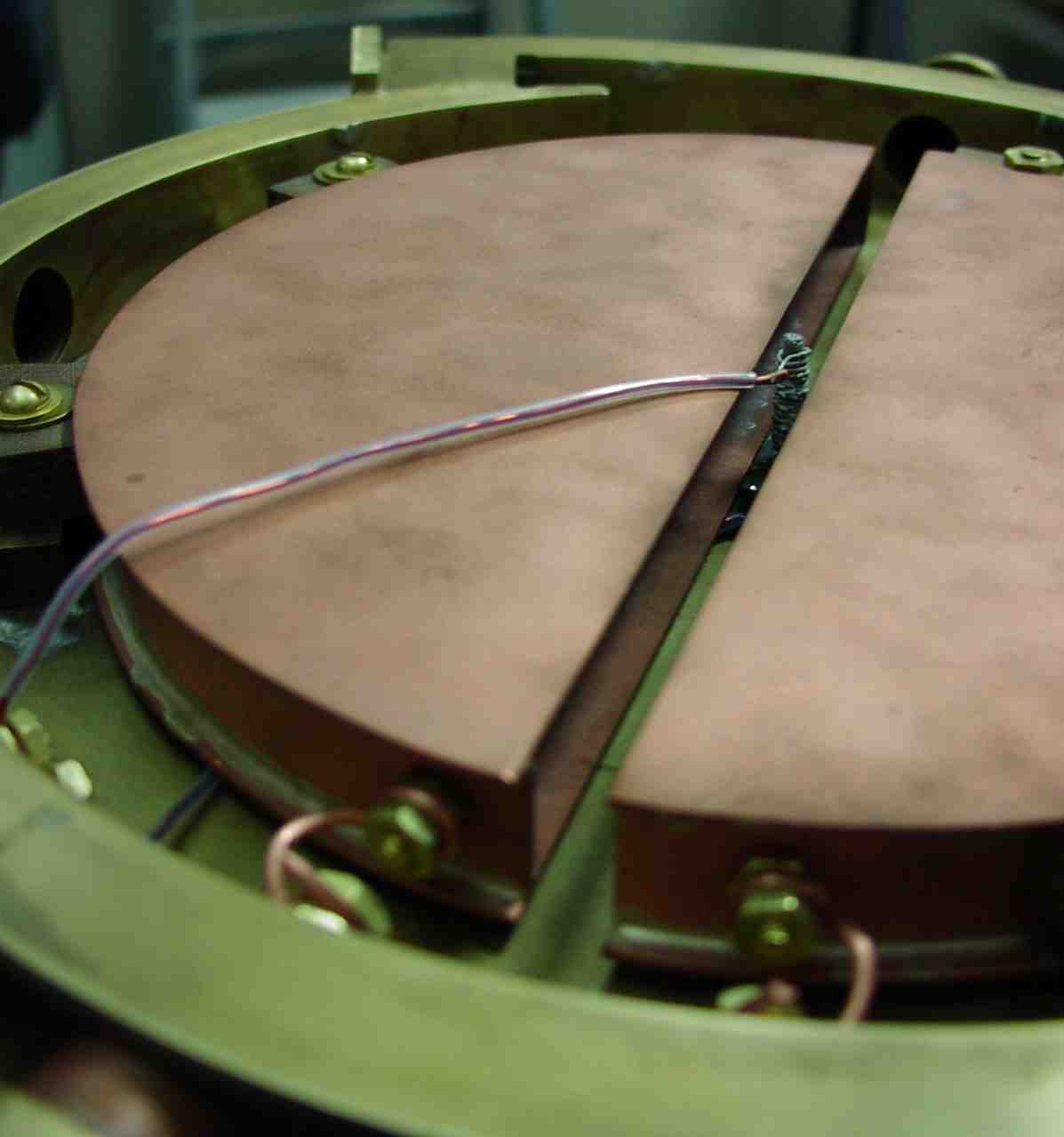 The first few pictures of the cyclotron give you a sense of its ...